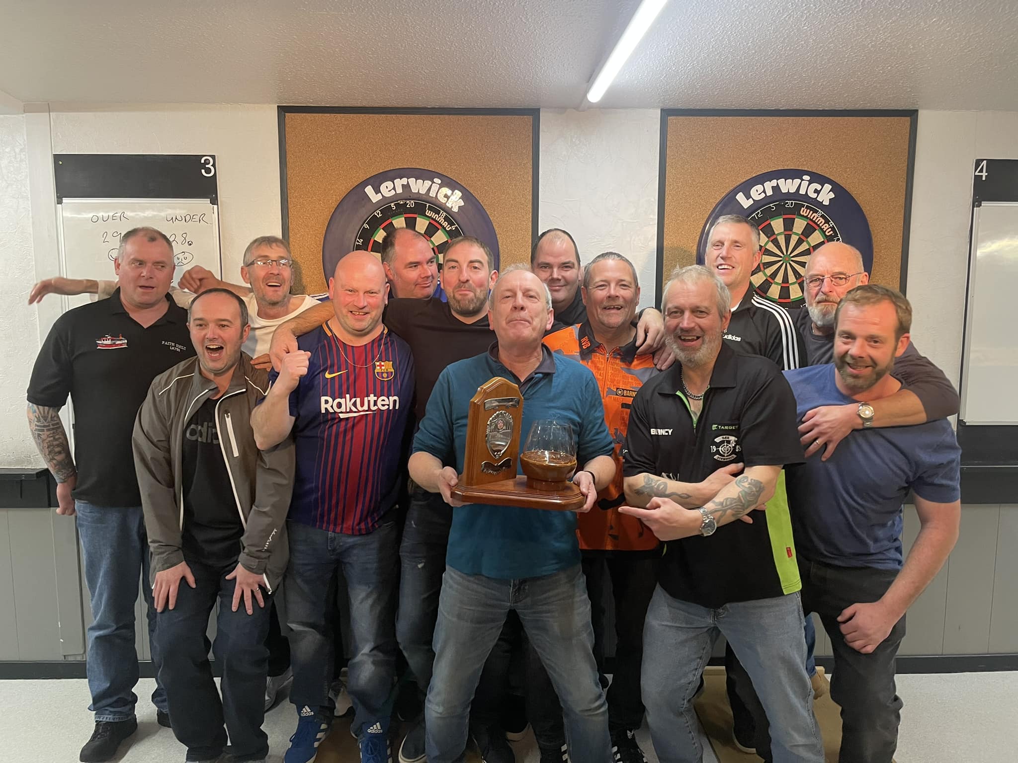 Over 40's regain the Under's v Over's Trophy. | Shetland Darts Association